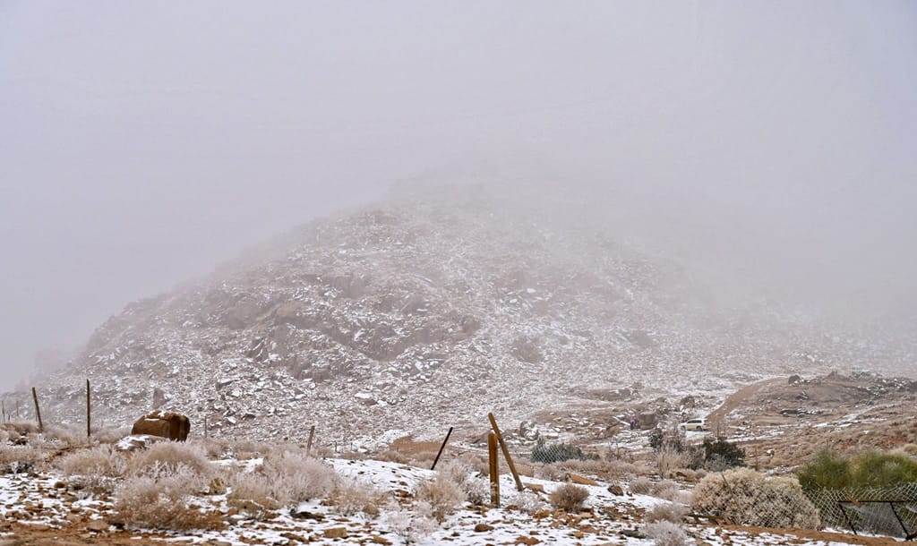 Snowfall In Saudi Arabian Desert: Historic Winter Scene